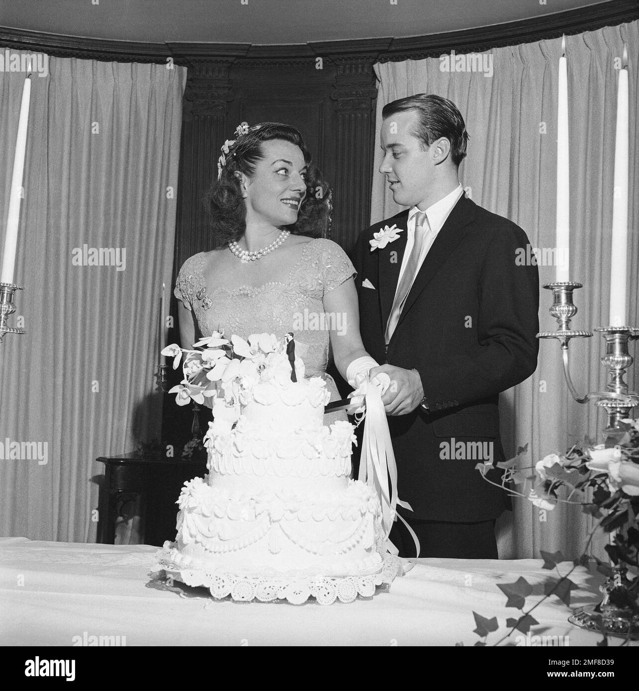 Albert C. Bostwick Jr., 21, poses with his beaming bride, Mollie ...