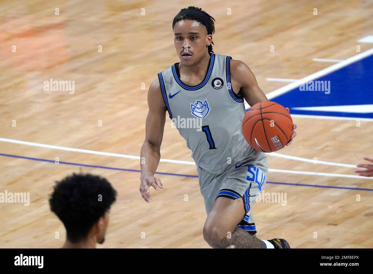 Saint Louis' Yuri Collins brings the ball down the court during the ...