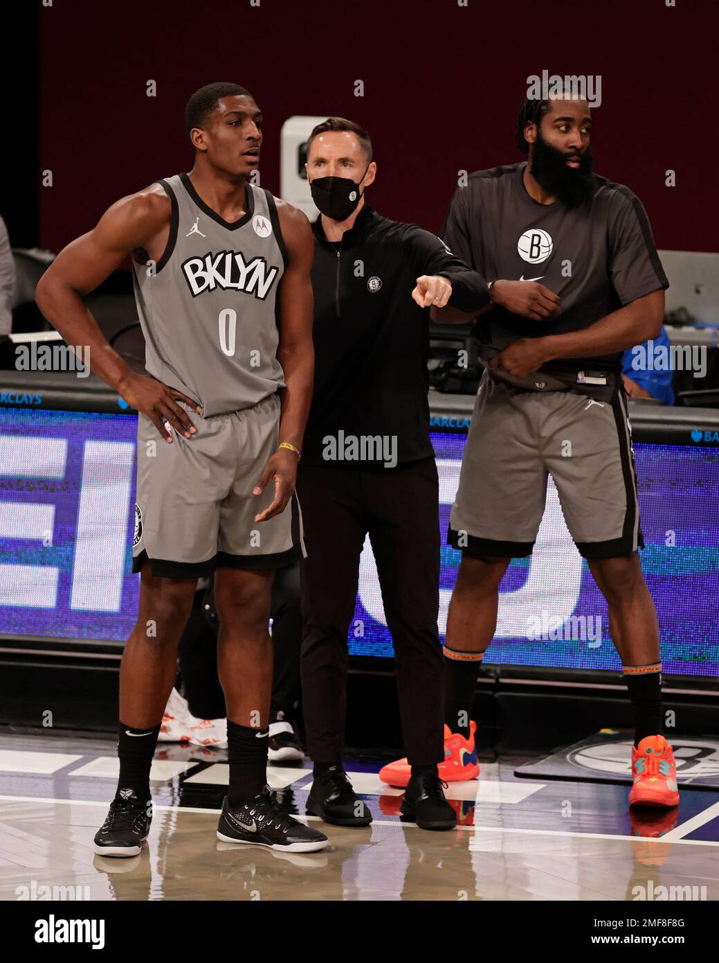 Brooklyn Nets forward Reggie Perry (0) talks to head coach Steve Nash ...
