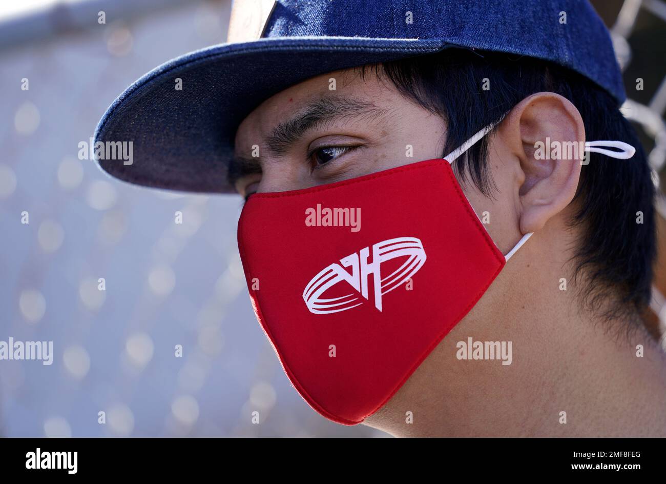 Van Halen fan Max Toledo wears a homemade Van Halen-themed mask before ...