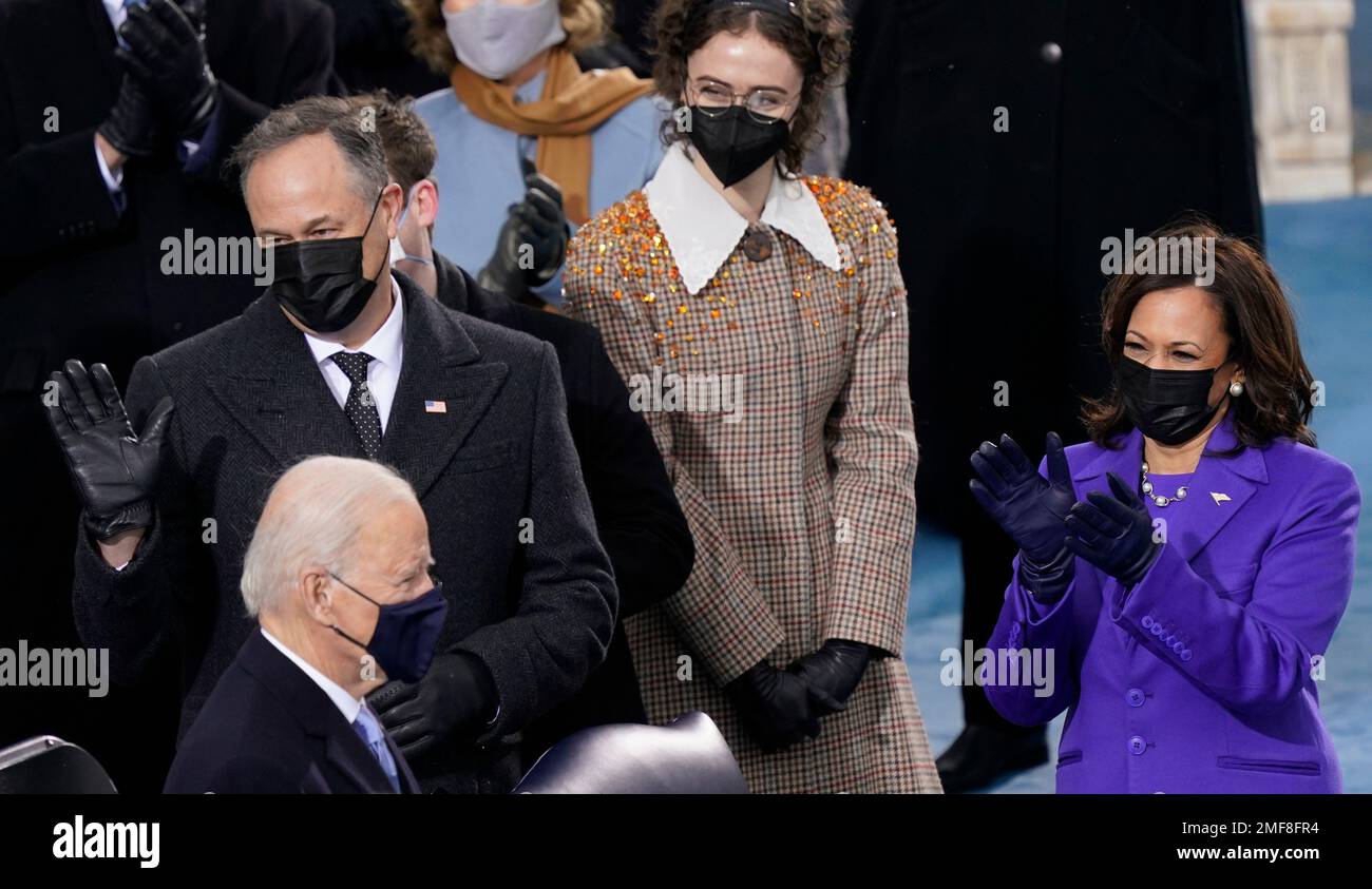 Vice President-elect Kamala Harris applauds with husband Doug Emhoff ...