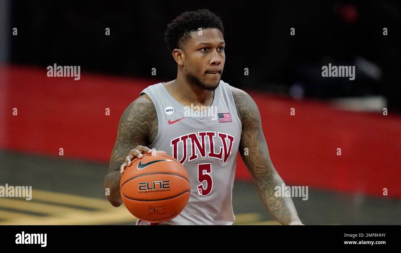 UNLV's David Jenkins Jr. (5) plays against Utah State in an NCAA ...