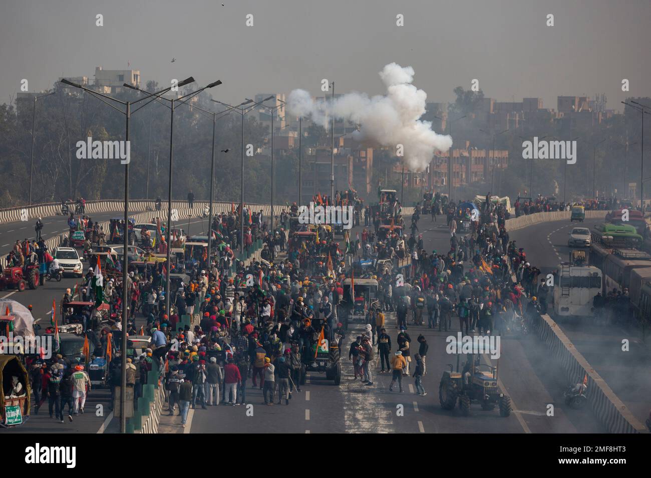 Indian police fire tear gas shells towards protesting farmer as they ...