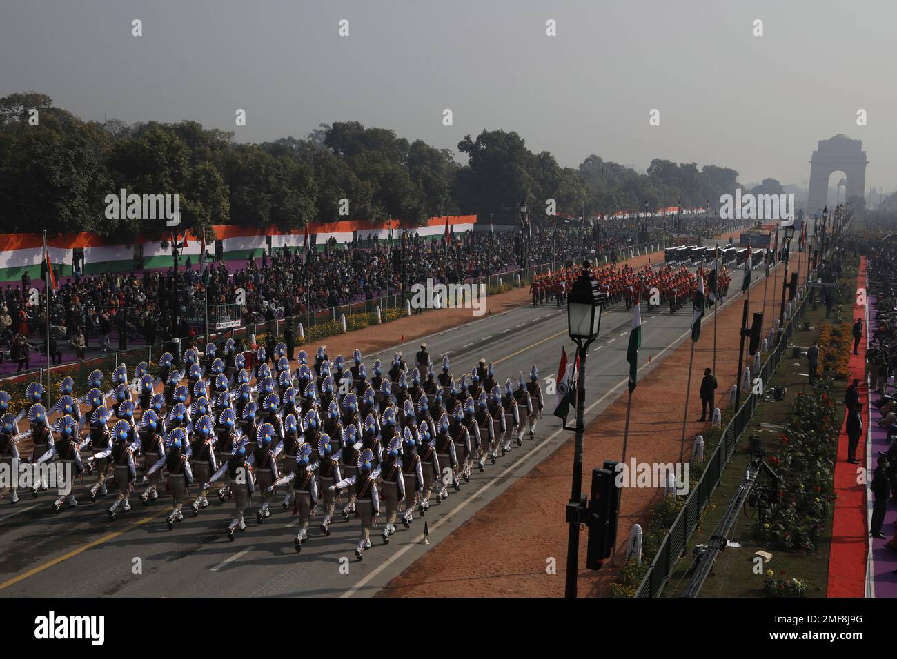 Indian paramilitary soldiers march through the ceremonial Rajpath ...