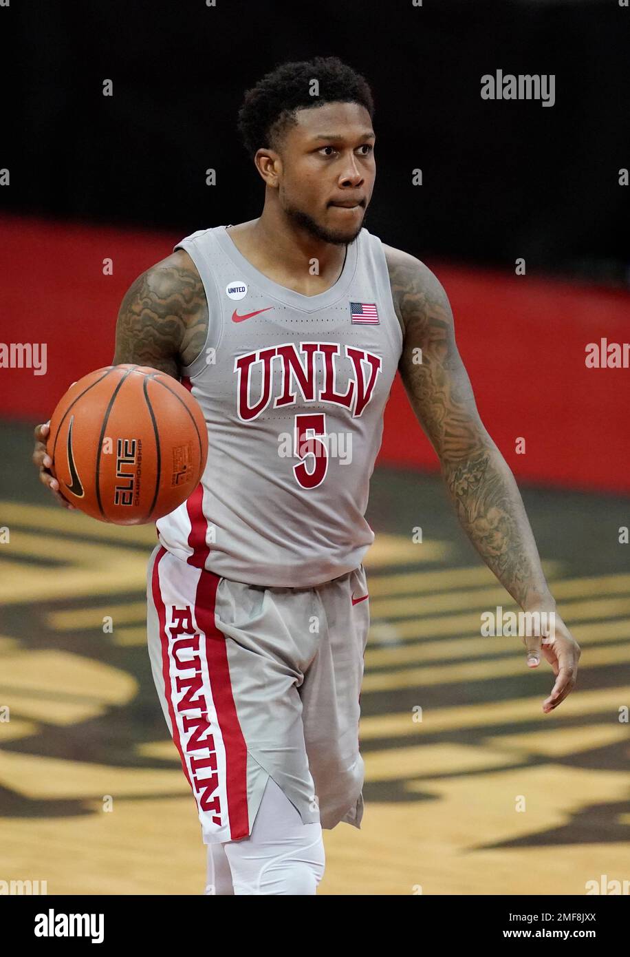 UNLV's David Jenkins Jr. (5) plays against Utah State in an NCAA ...