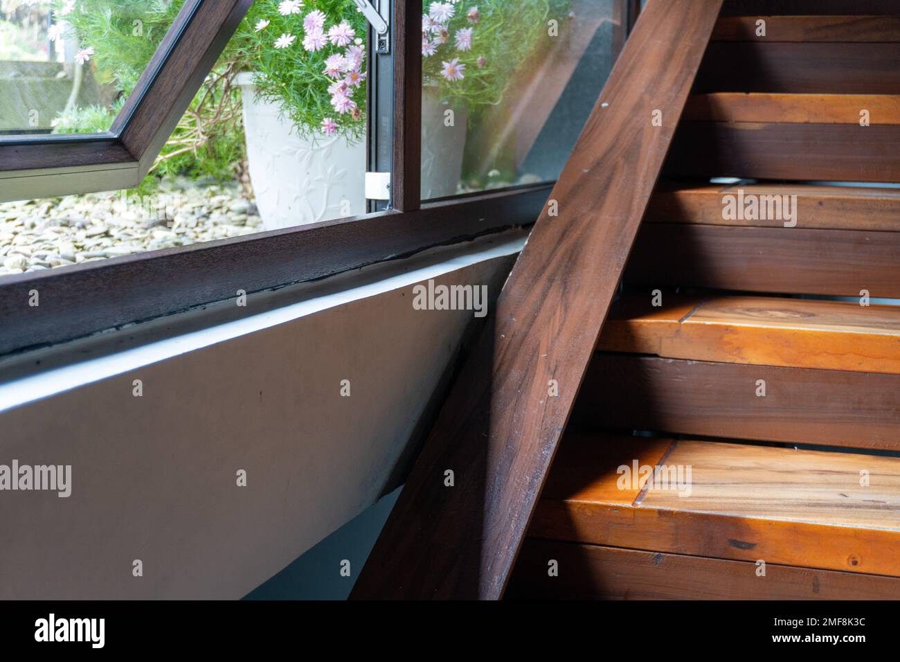 Wooden stairs near window inside a nature cafe landscape Stock Photo ...