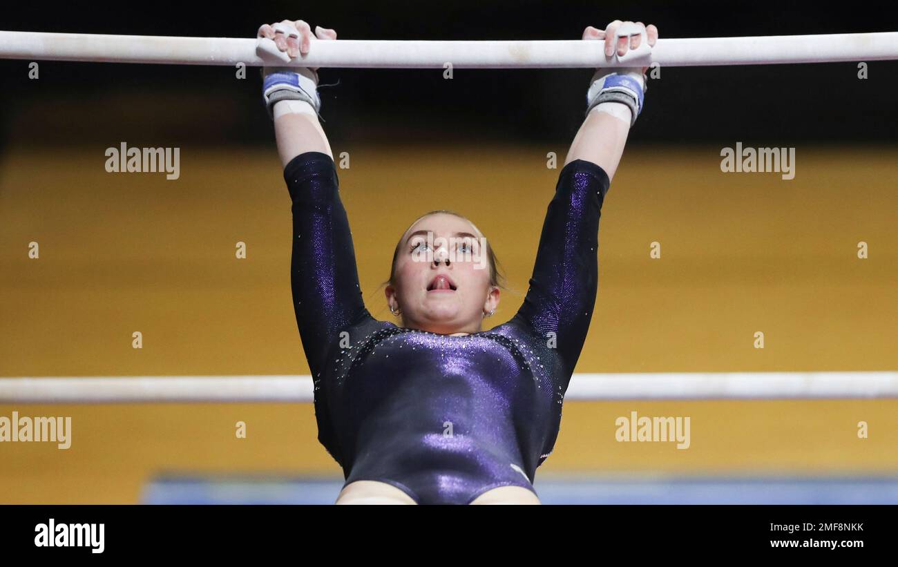 Washington's Morgan Bowles competes on the uneven bars during an NCAA ...