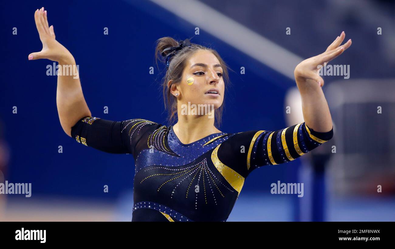 Michigan's Nicoletta Koulos performs on the floor during an NCAA ...