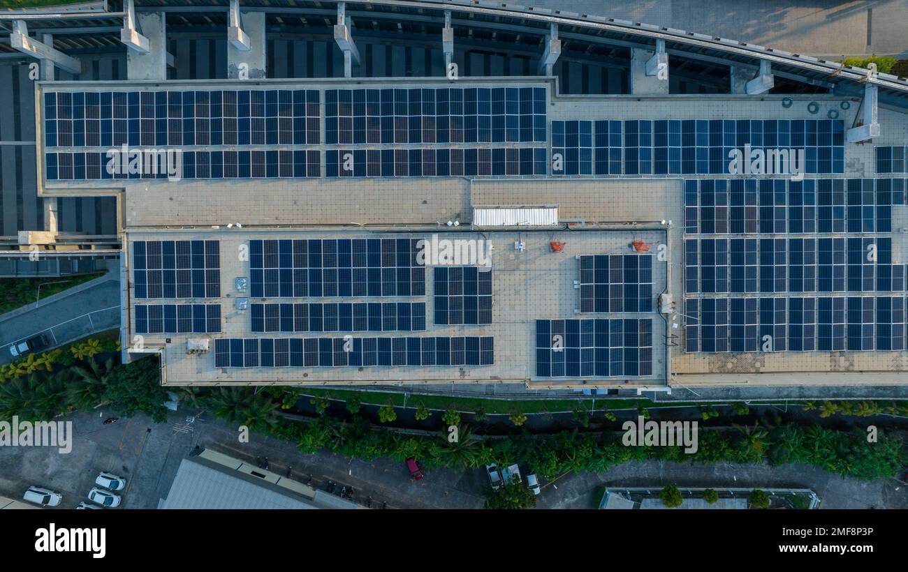 Top view of blue solar photo voltaic panels system on high apartment ...