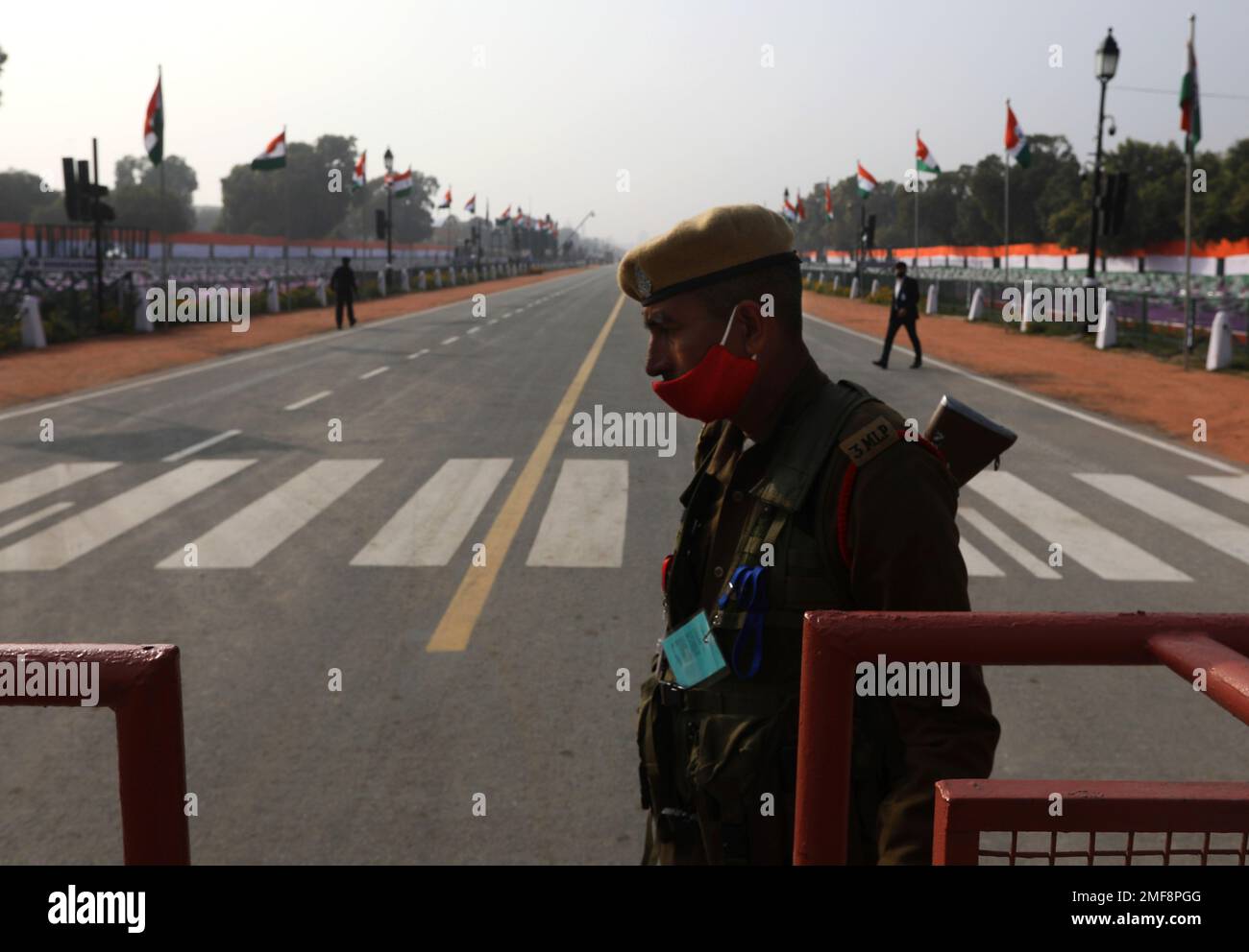 Indian para-military force soldiers stand guard at Rajpath, the main ...