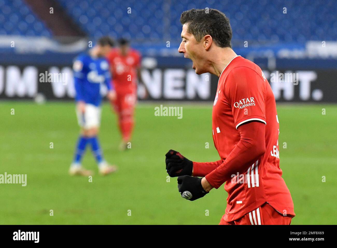 Bayern's Robert Lewandowski celebrates after scoring during the German ...