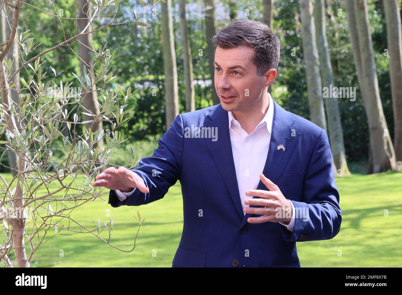 Secretary of Transportation Pete Buttigieg speaking at an event in the ...