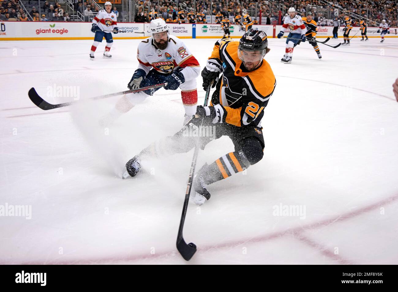 Pittsburgh Penguins' Ryan Poehling (25) controls the puck in the corner ...