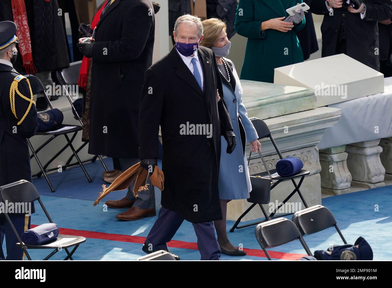 Former President George W. Bush and his wife Laura arrive for the 59th ...