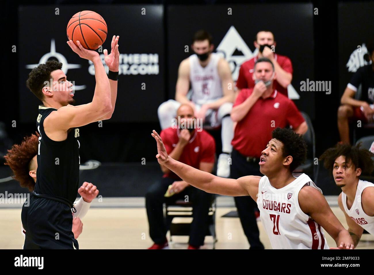 Colorado guard Maddox Daniels shoots as Washington State center Dishon ...