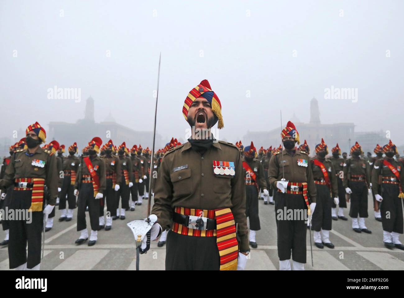 Major Piyush Sharma, from Indian Army Bengal Sappers, gives a command to his contingent for ...