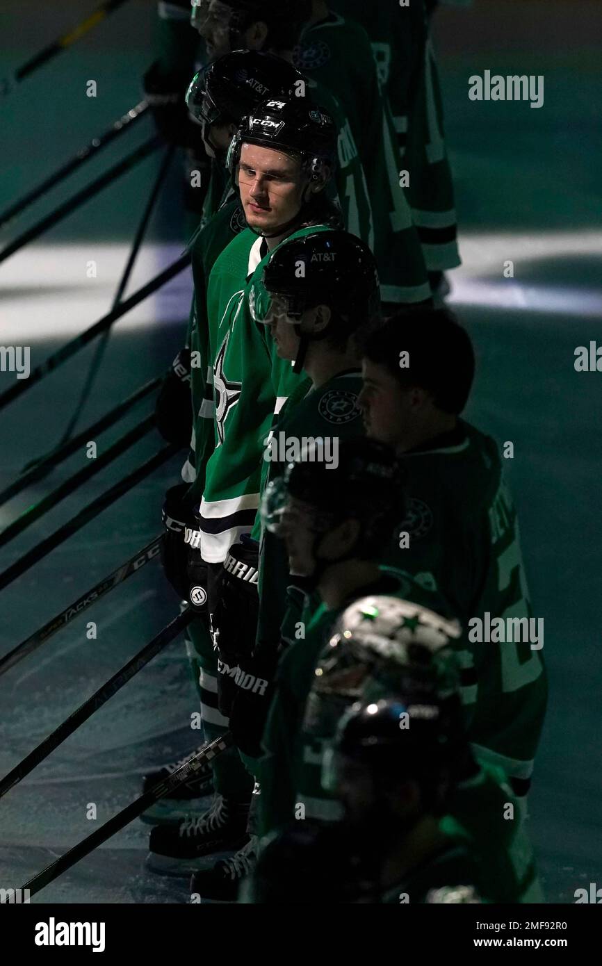 Dallas Stars left wing Roope Hintz (24) stands by teammates during team ...