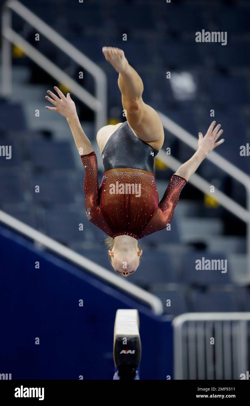 Minnesota's Lexy Ramler competes on the beam during an NCAA gymnastics ...