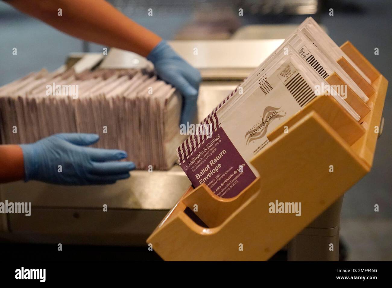 FILE - In this Nov. 1, 2020, file photo, envelopes containing ballots ...