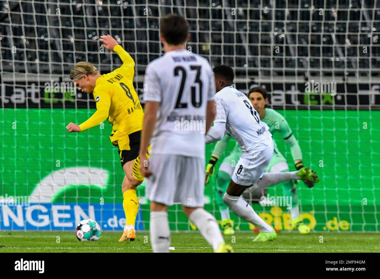 Dortmund's Erling Haaland, left, scores his second goal during the ...