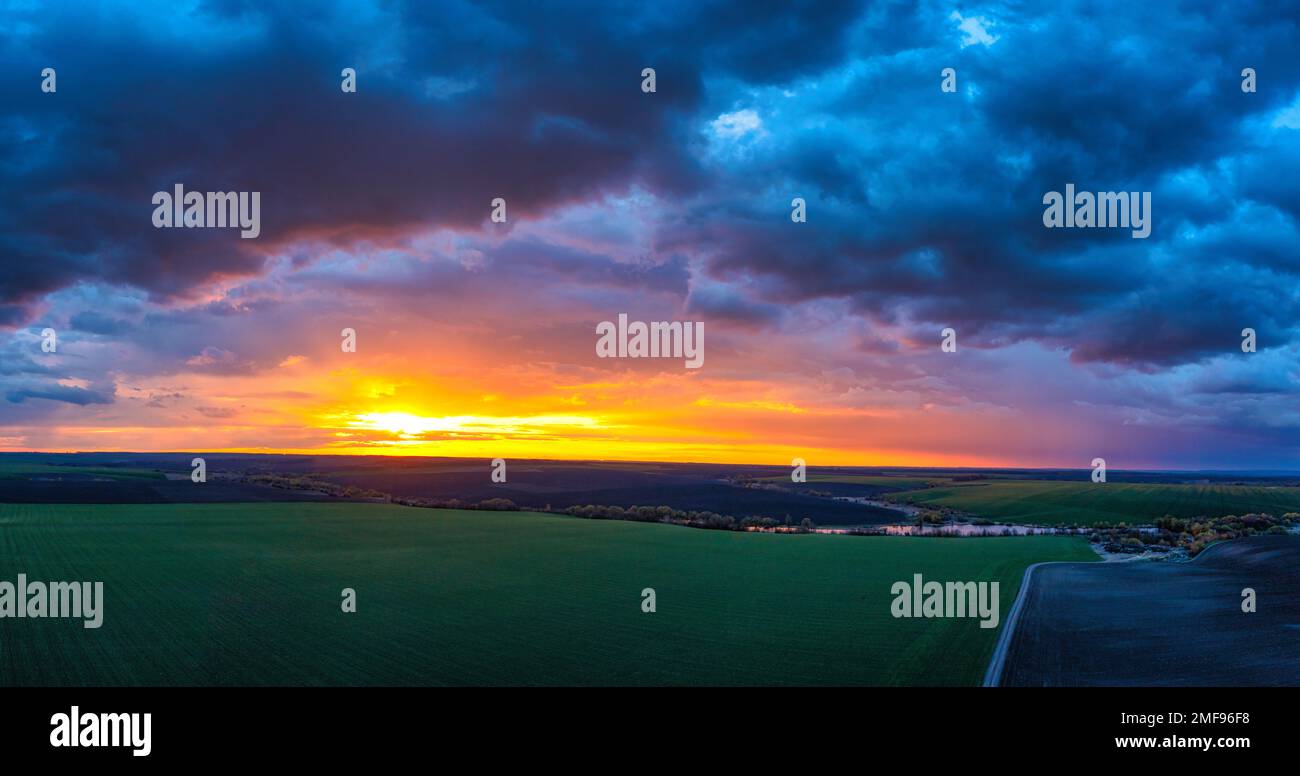 A wonderful sunset. Yellow-orange clouds against the background of the ...