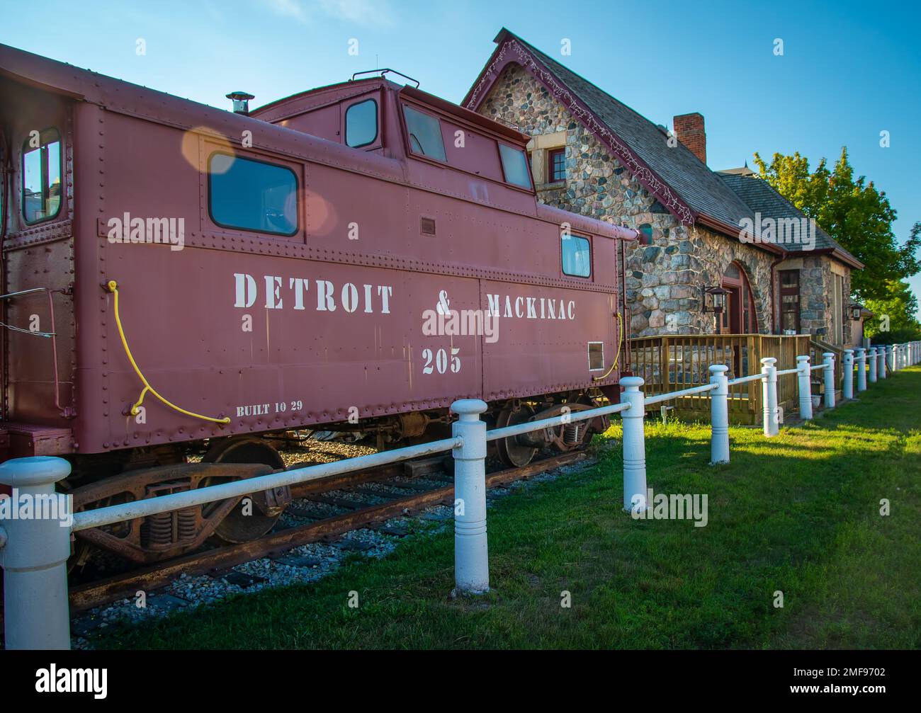 Passenger cars and old caboose stored at historic Standish Michigan ...