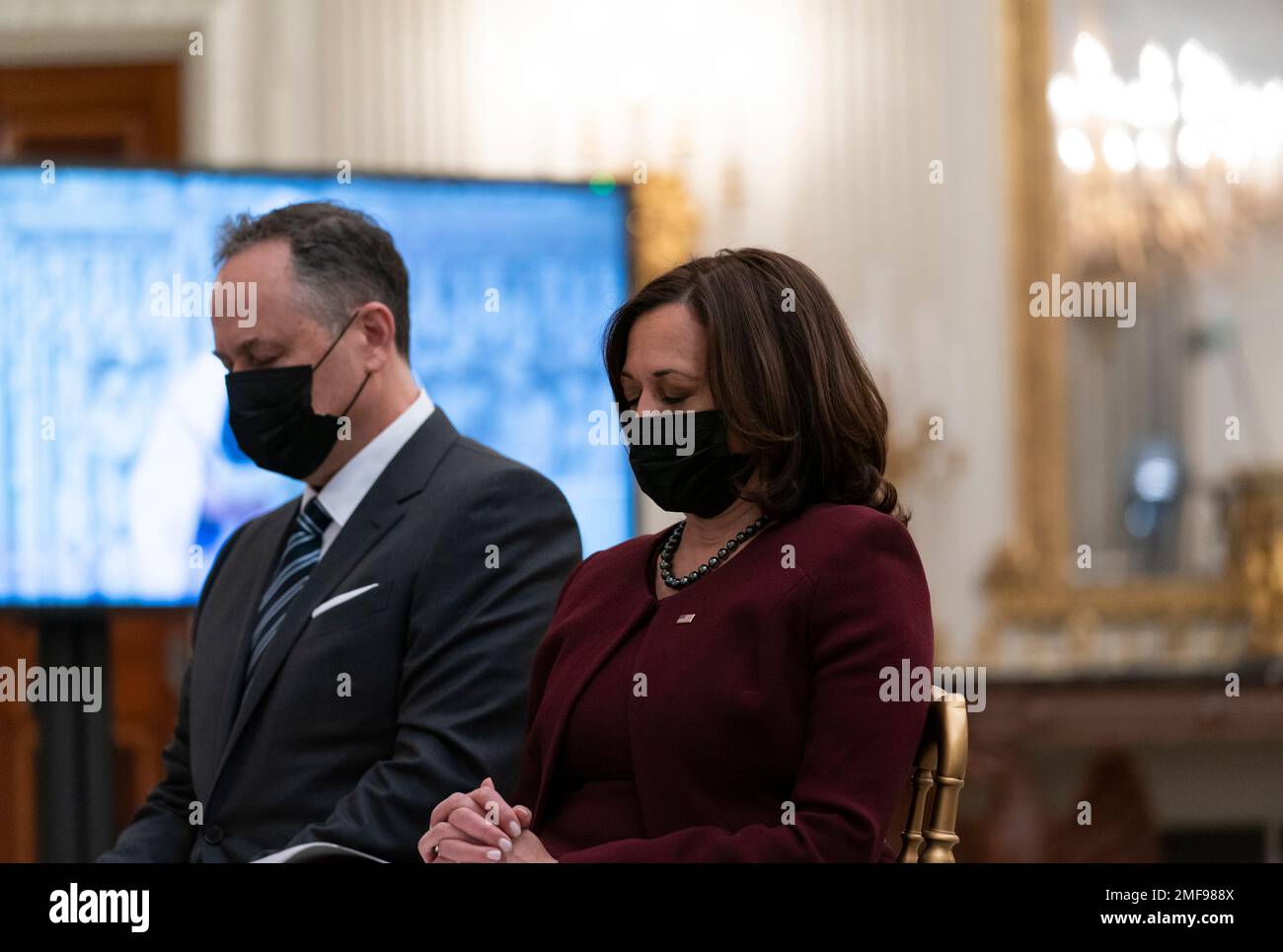 Vice President Kamala Harris, right, and her husband Doug Emhoff, bow ...