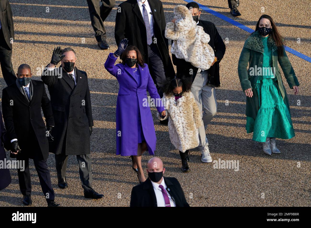 Vice President Kamala Harris and her husband Doug Emhoff walk in the ...