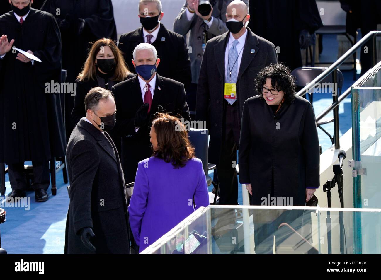 Kamala Harris looks towards her husband Doug Emhoff after she was sworn ...