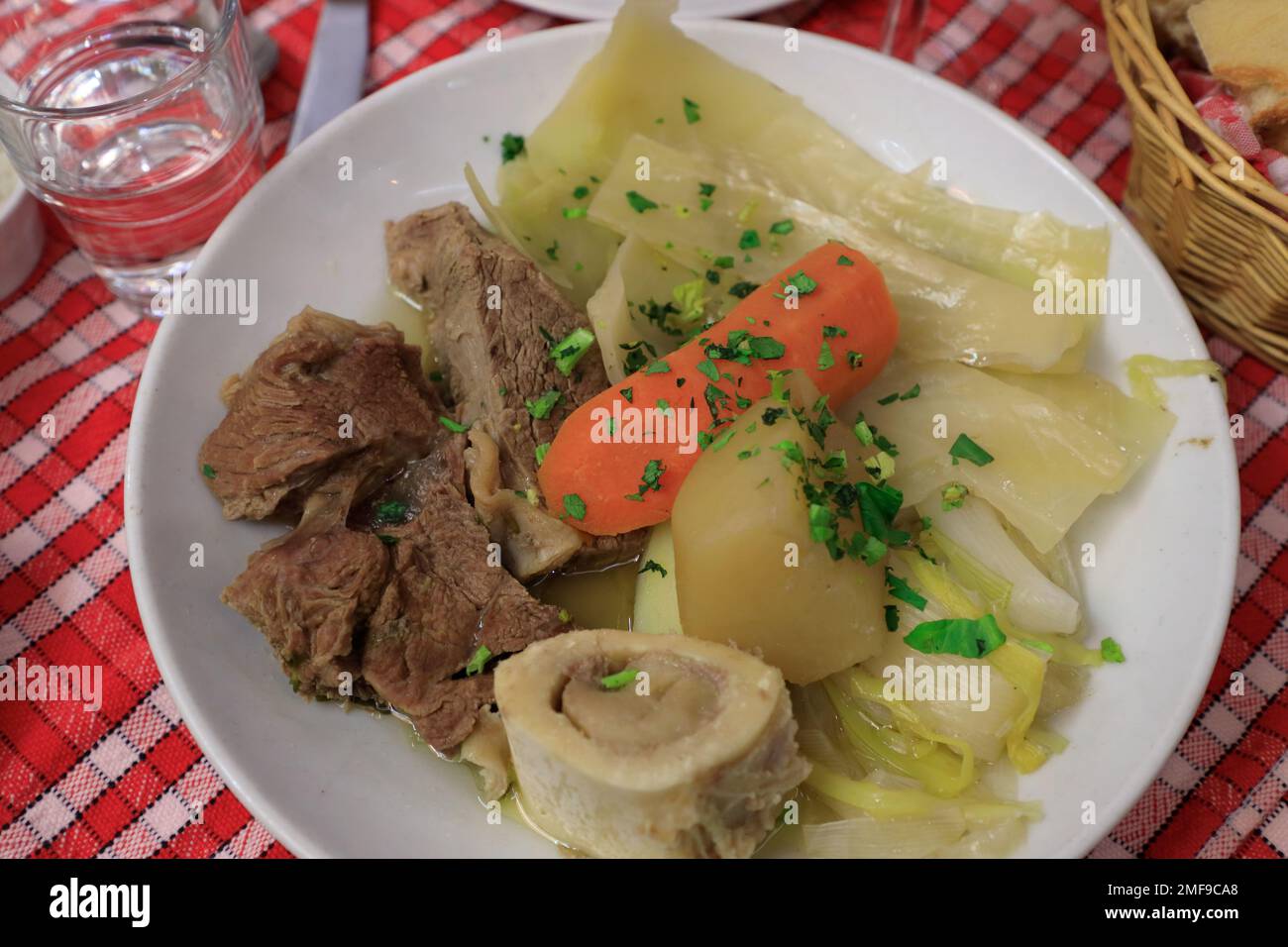 Traditional French beef stew Pot au Feu served in restaurant Le Roi du ...