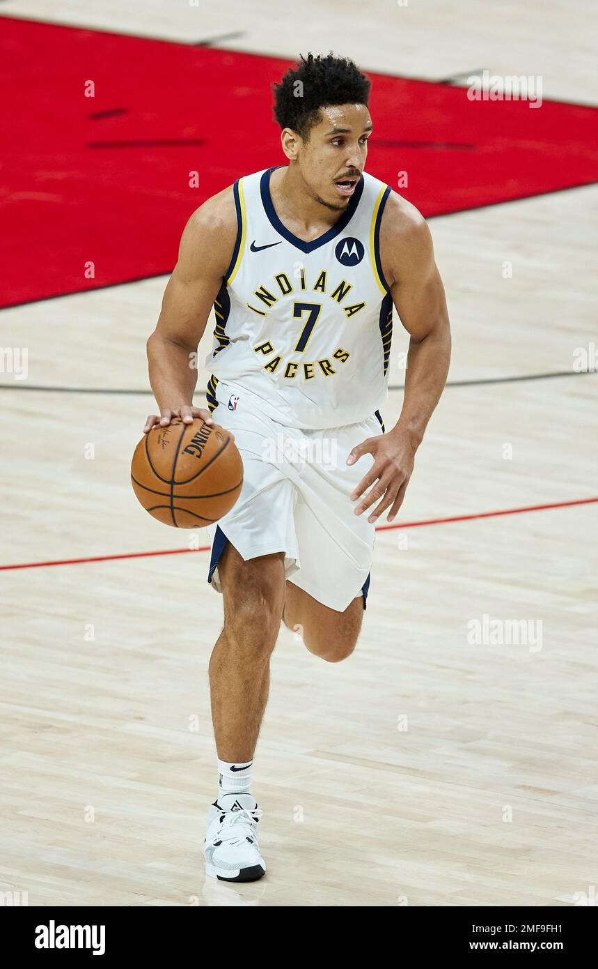 Indiana Pacers guard Malcolm Brogdon dribbles against the Portland ...