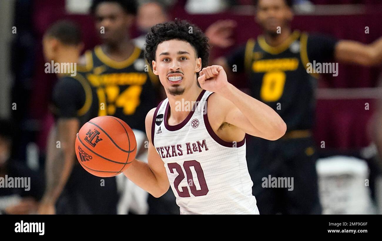 Texas A&M guard Andre Gordon (20) brings the ball down the court ...