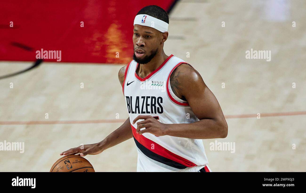 Portland Trail Blazers guard Rodney Hood brings the ball up court ...
