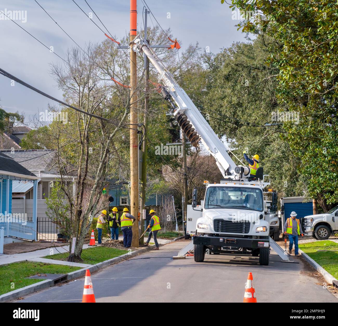 NEW ORLEANS, LA, USA - JANUARY 20, 2023: Workers and truck with ...