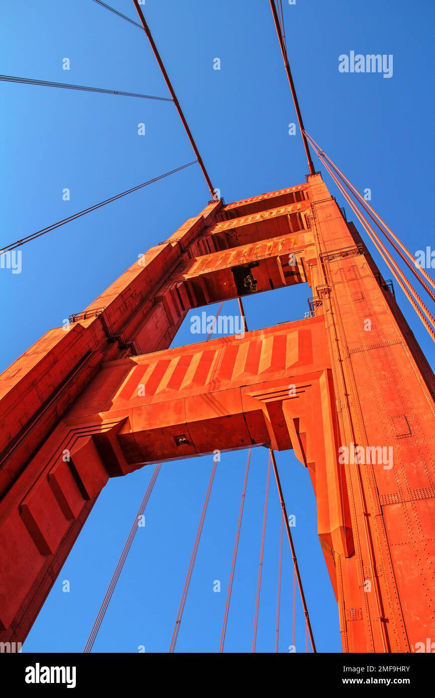 Golden Gate Bridge's towering gate against a clear San Francisco summer ...