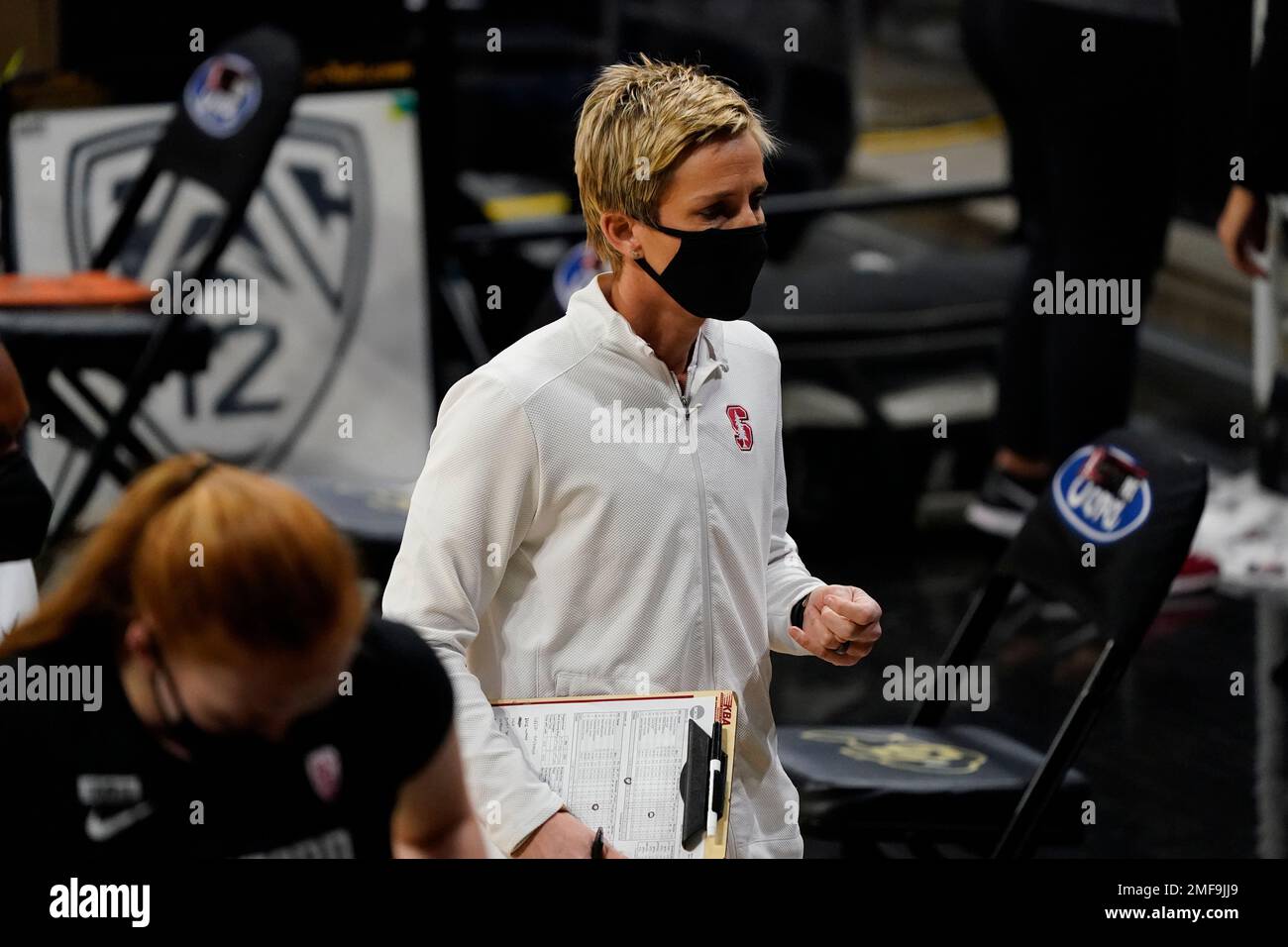 Stanford assistant coach Kate Paye in the second half of an NCAA ...