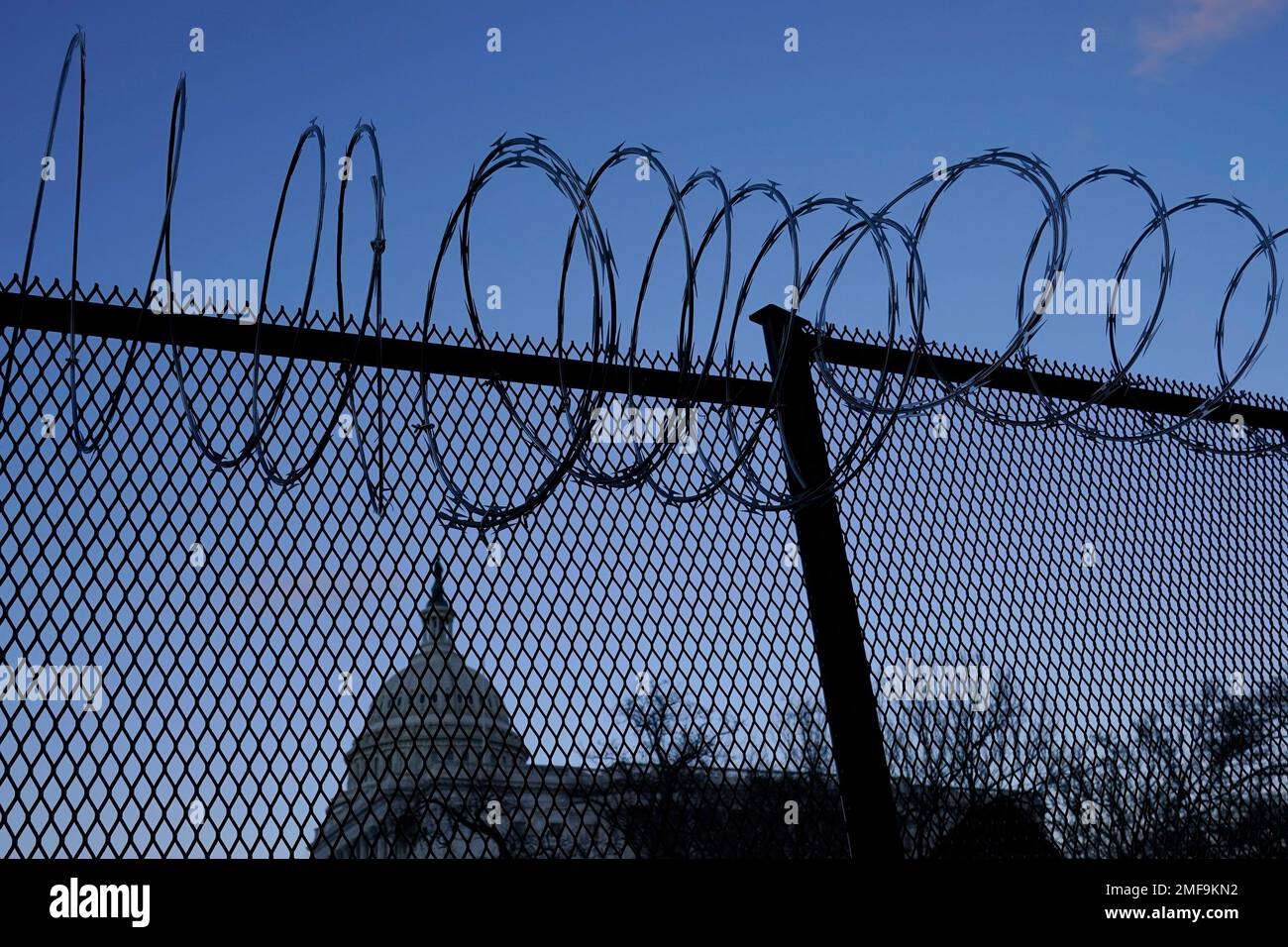 Razor wire is on top of security fencing that surrounds the U.S ...