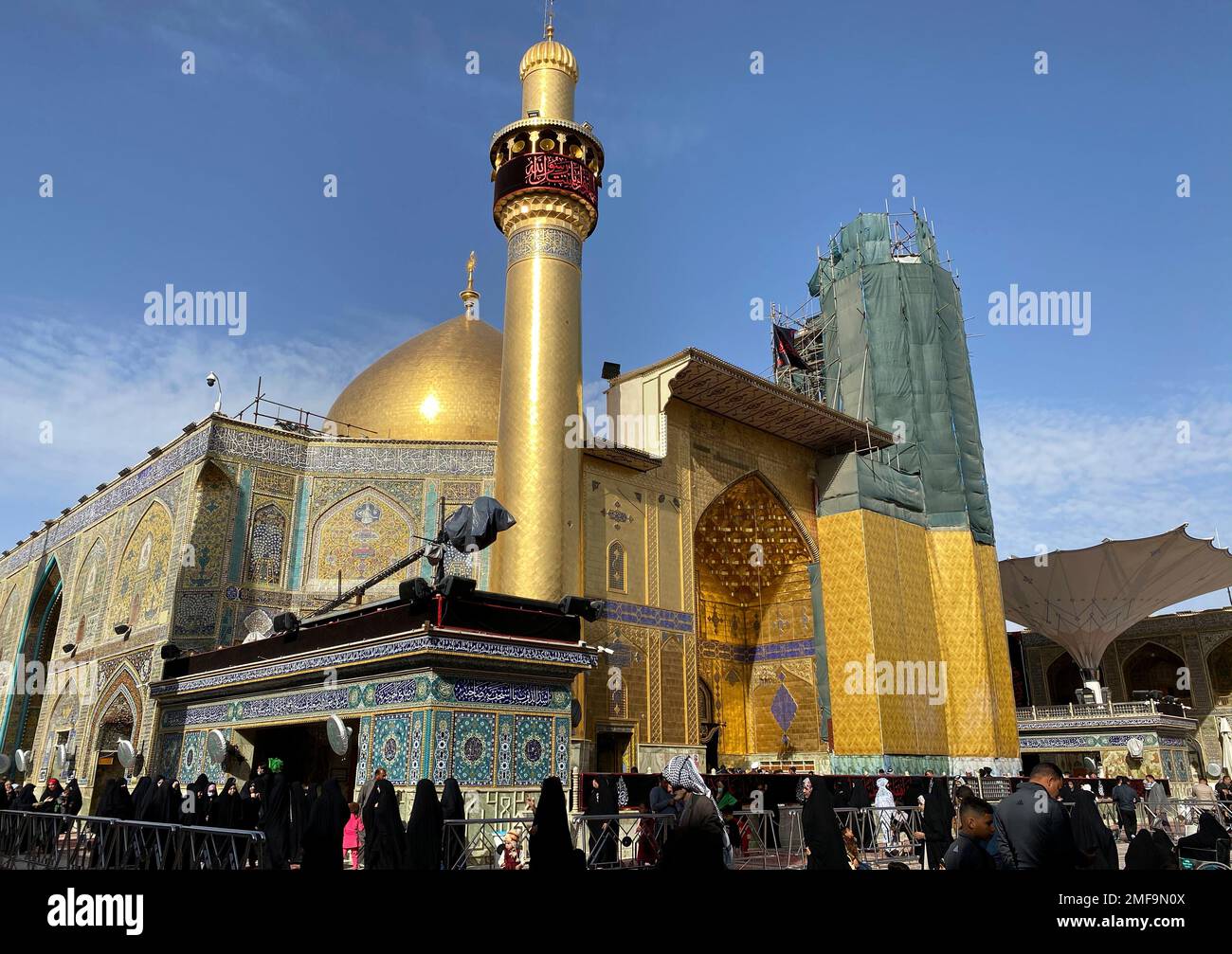 Shiite Muslim worshippers visit the holy shrine of Imam Ali, the son-in ...