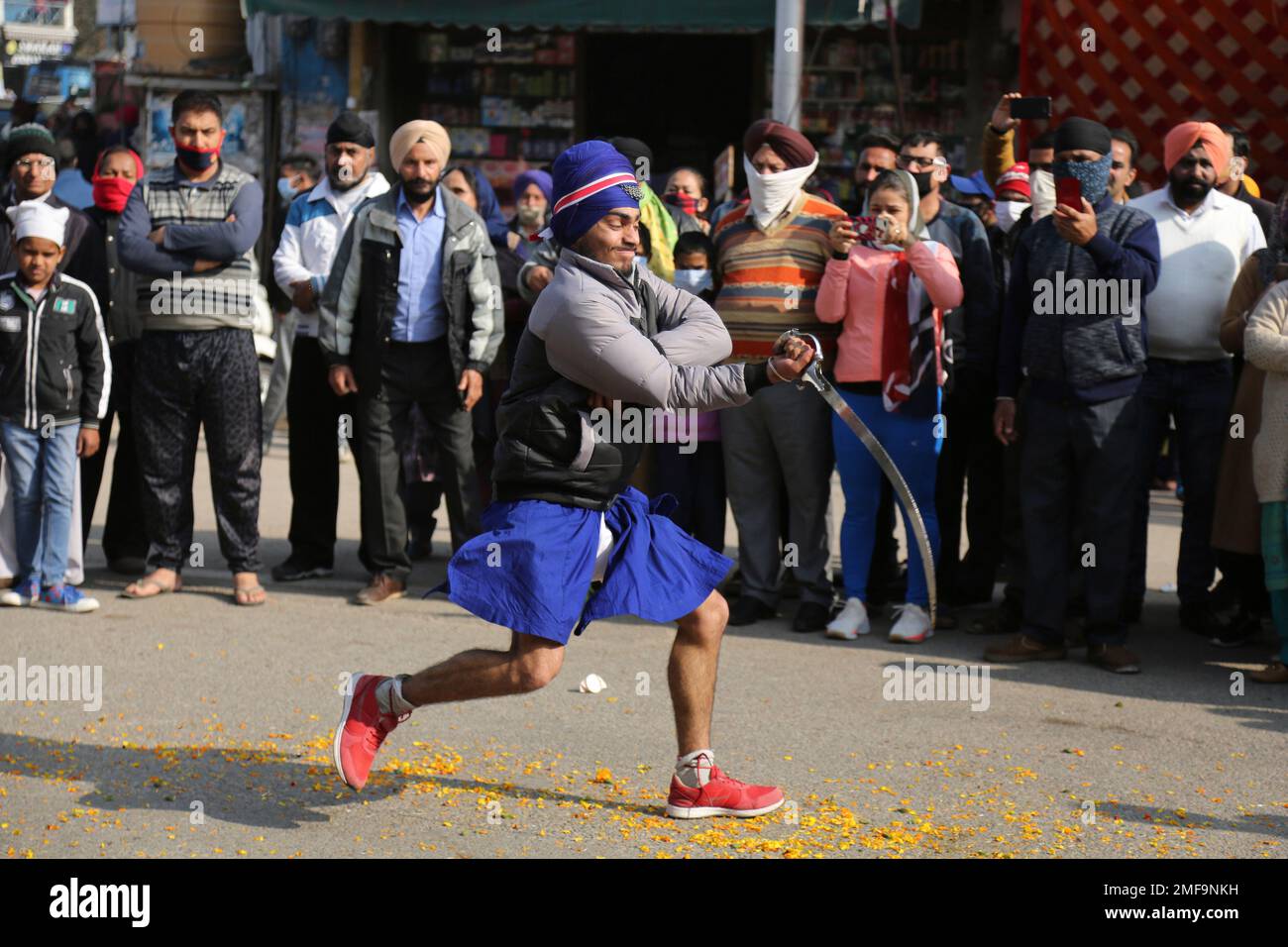 An Indian Sikh warrior displays traditional martial art skills during a ...