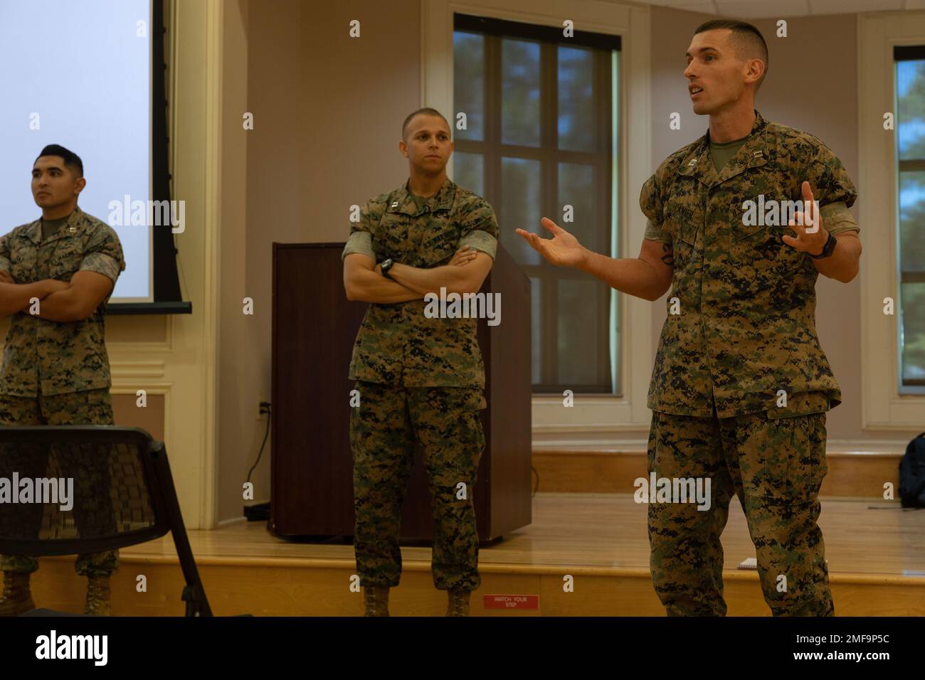 U.S. Marine Corps Capt. Wes Lanier, right, company ground monitor ...