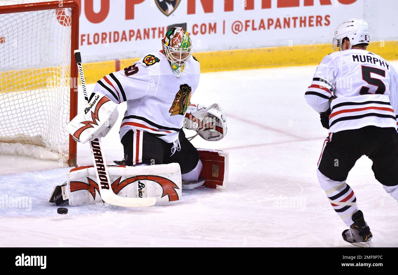 Chicago Blackhawks goaltender Collin Delia (60) makes a save as ...