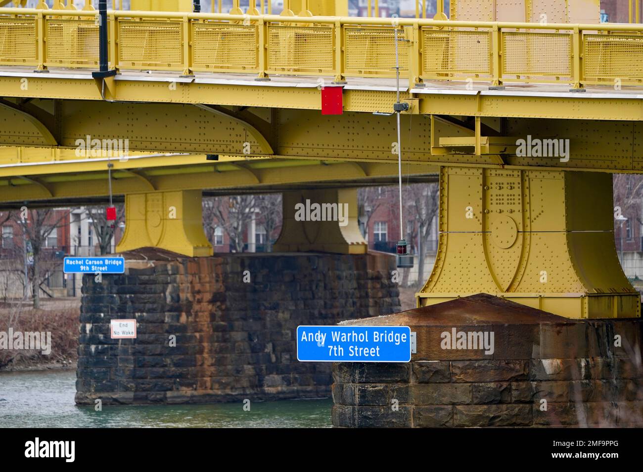Signs marking the newest names of two of the "Three Sisters Bridges ...
