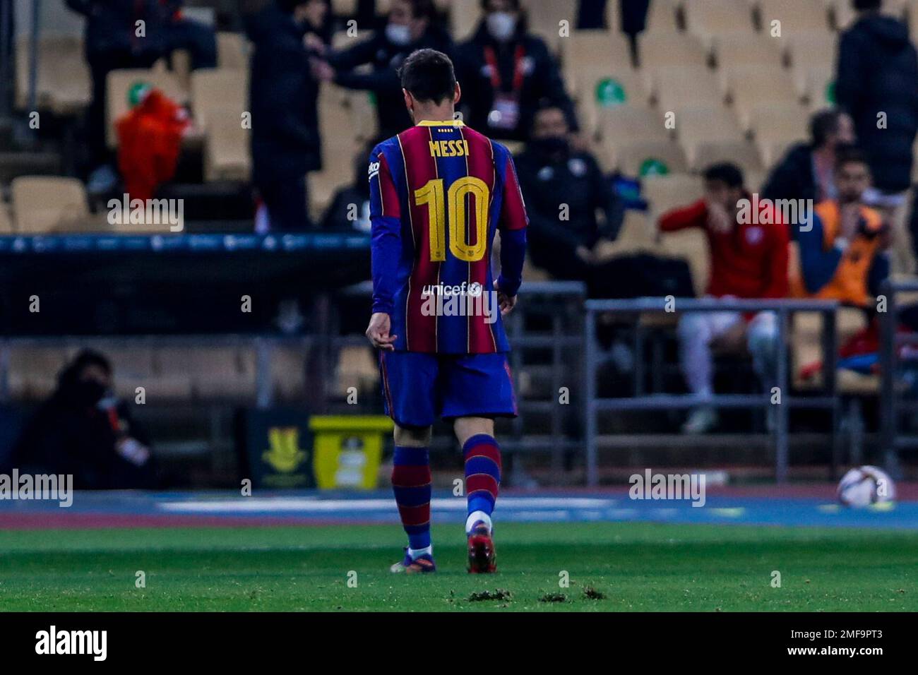 Barcelona's Lionel Messi walks out of the pitch after being shown a red ...