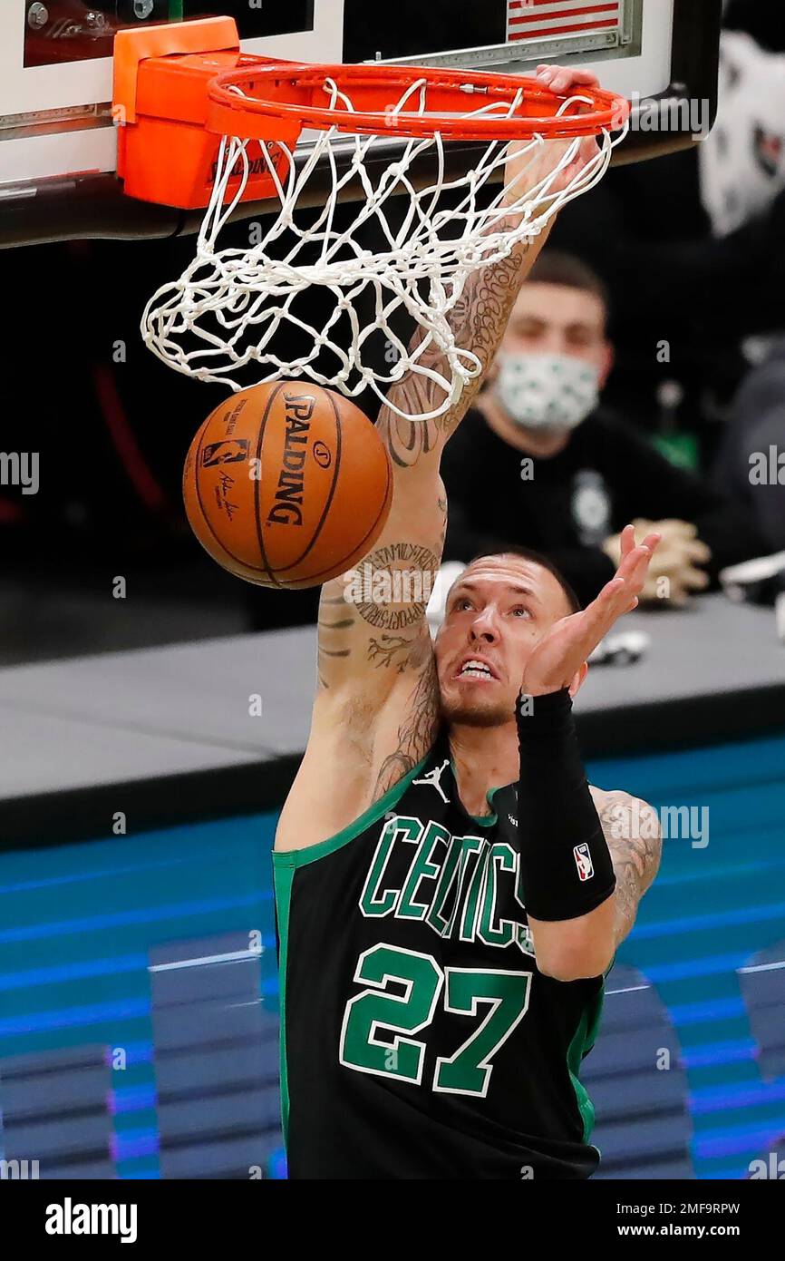Boston Celtics' Daniel Theis dunks during the first half of an NBA ...
