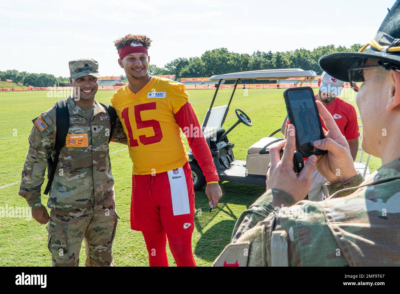 U.S. service members attend the Kansas City Chiefs training camp in St ...