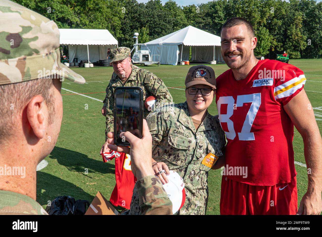 U.S. service members attend the Kansas City Chiefs training camp in St ...