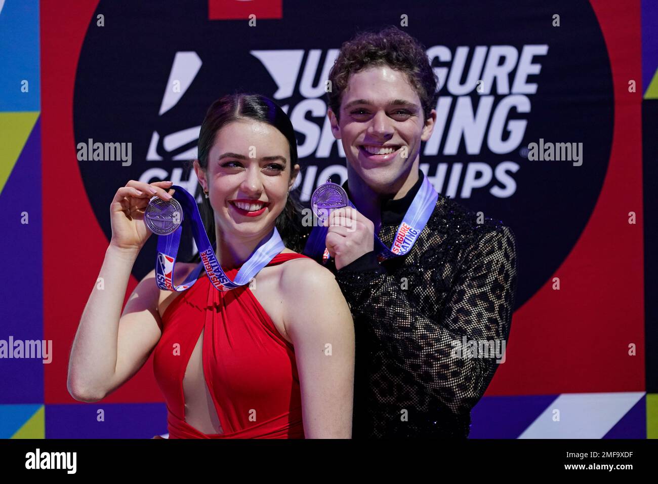 Fourth place finishers Caroline Green and Michael Parsons pose with ...