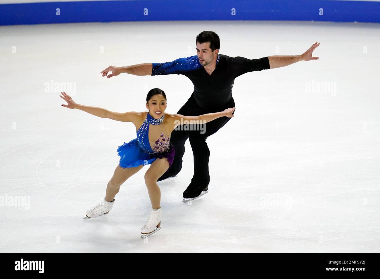Jessica Calalang and Brian Johnson perform during the pairs free skate ...
