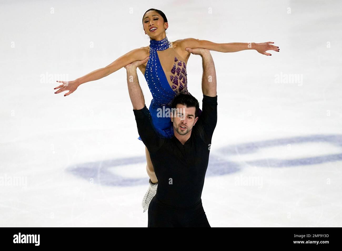 Jessica Calalang and Brian Johnson perform during the pairs free skate ...