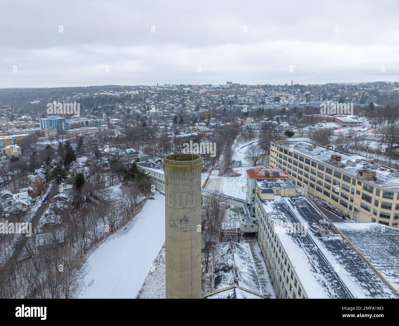 Winter aerial drone photo of an abandoned industrial concrete smoke ...